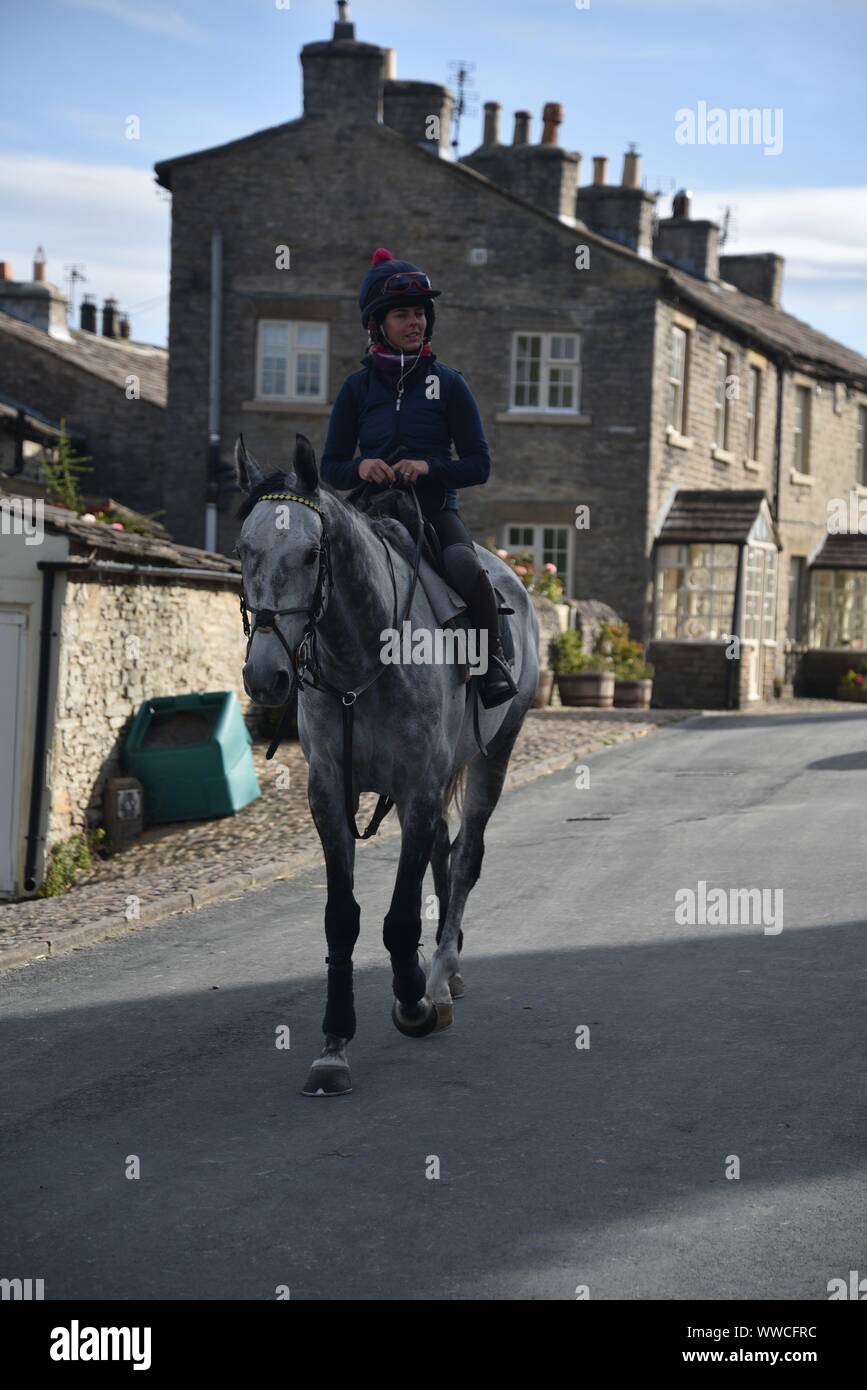 Middleham work riders Stock Photo - Alamy