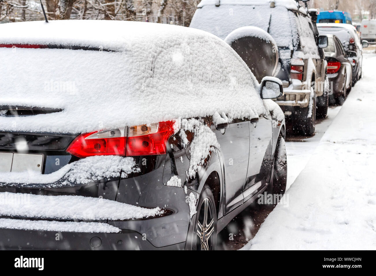 Snow on cars after snowfall Stock Photo - Alamy