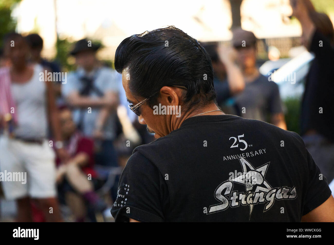 A Japanese man member of The Strangers, a Tokyo Rockabilly Club, dances ...