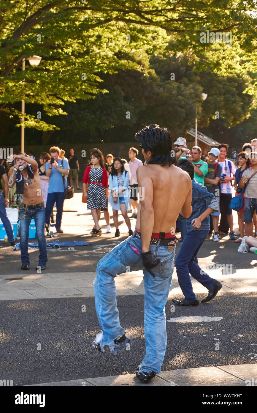 The Strangers, a Tokyo Rockabilly Club, dance at Yoyogi Park in Shibuya ...