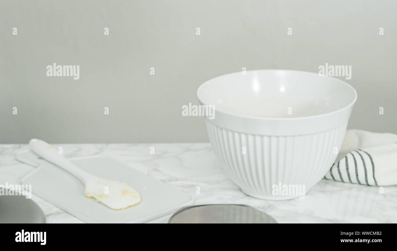 Step by step. Measuring cookie dought with a digital kitchen scale to ...