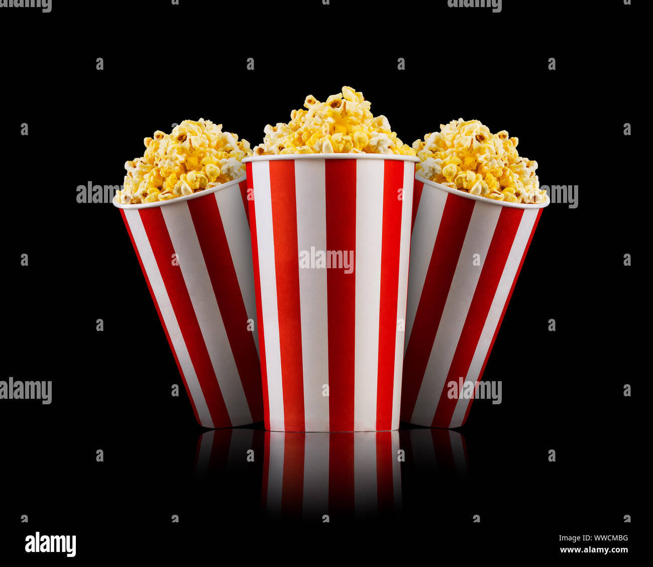 Set of paper striped buckets with popcorn isolated on black background ...