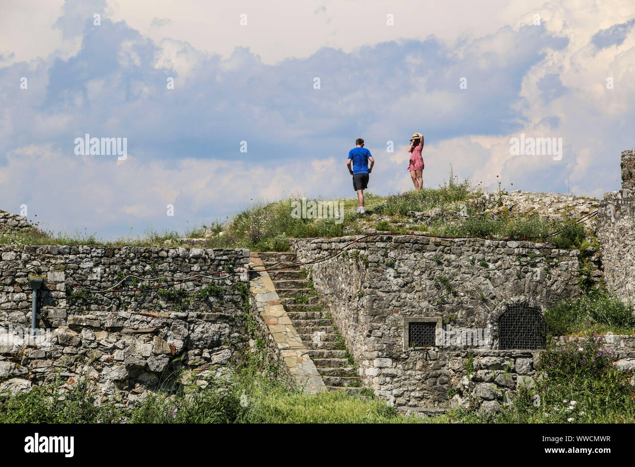 Tourists walk around historic ruins Rozafa Castle in Shkoder, Albania ...