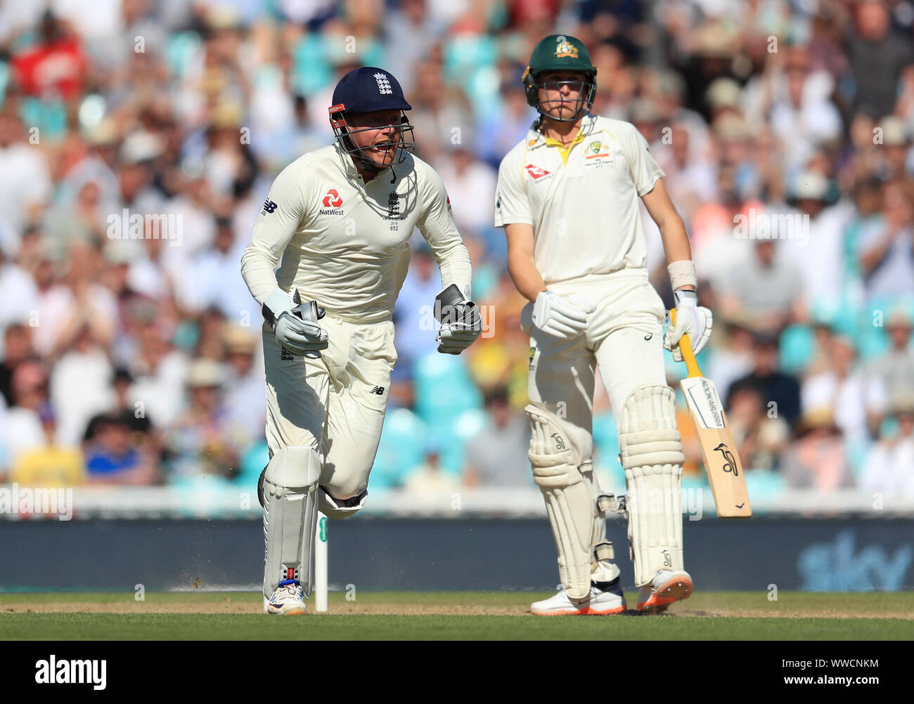 England's Jonny Bairstow (left) celebrates stumping out Australia's ...