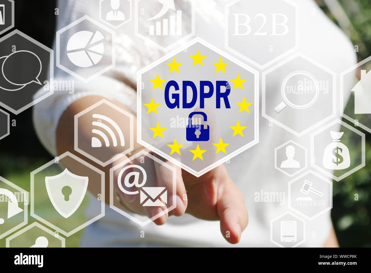 The businesswoman chooses the GDPR on the touch screen .General Data ...