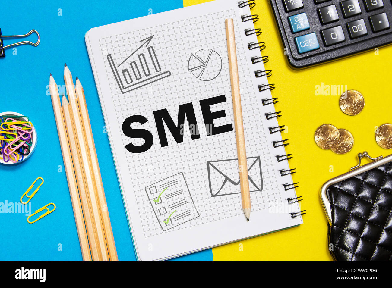Small and Medium Enterprise, SME notes in the notebook on the Desk of a ...