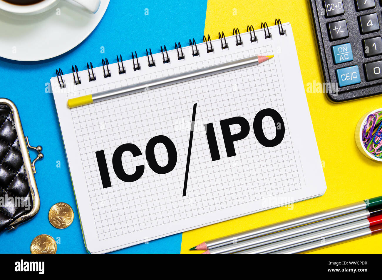 A Notebook with Business notes initial coin offering ICO vs IPO Initial ...