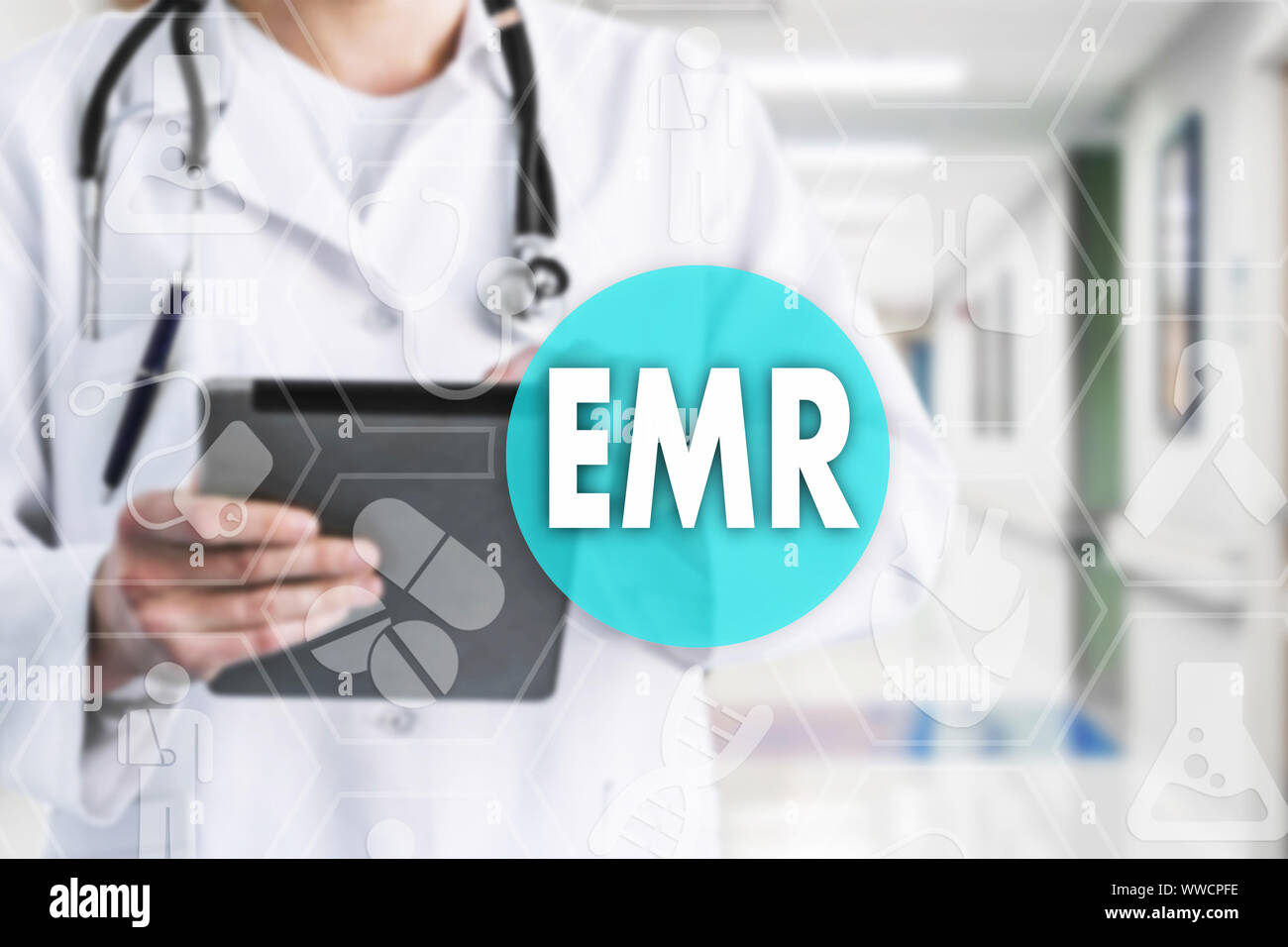 Electronic medical records. EMR on the touch screen with medicine icons ...