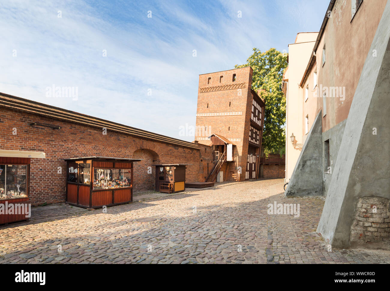 The leaning tower in Toru. Medieval city walls Stock Photo - Alamy