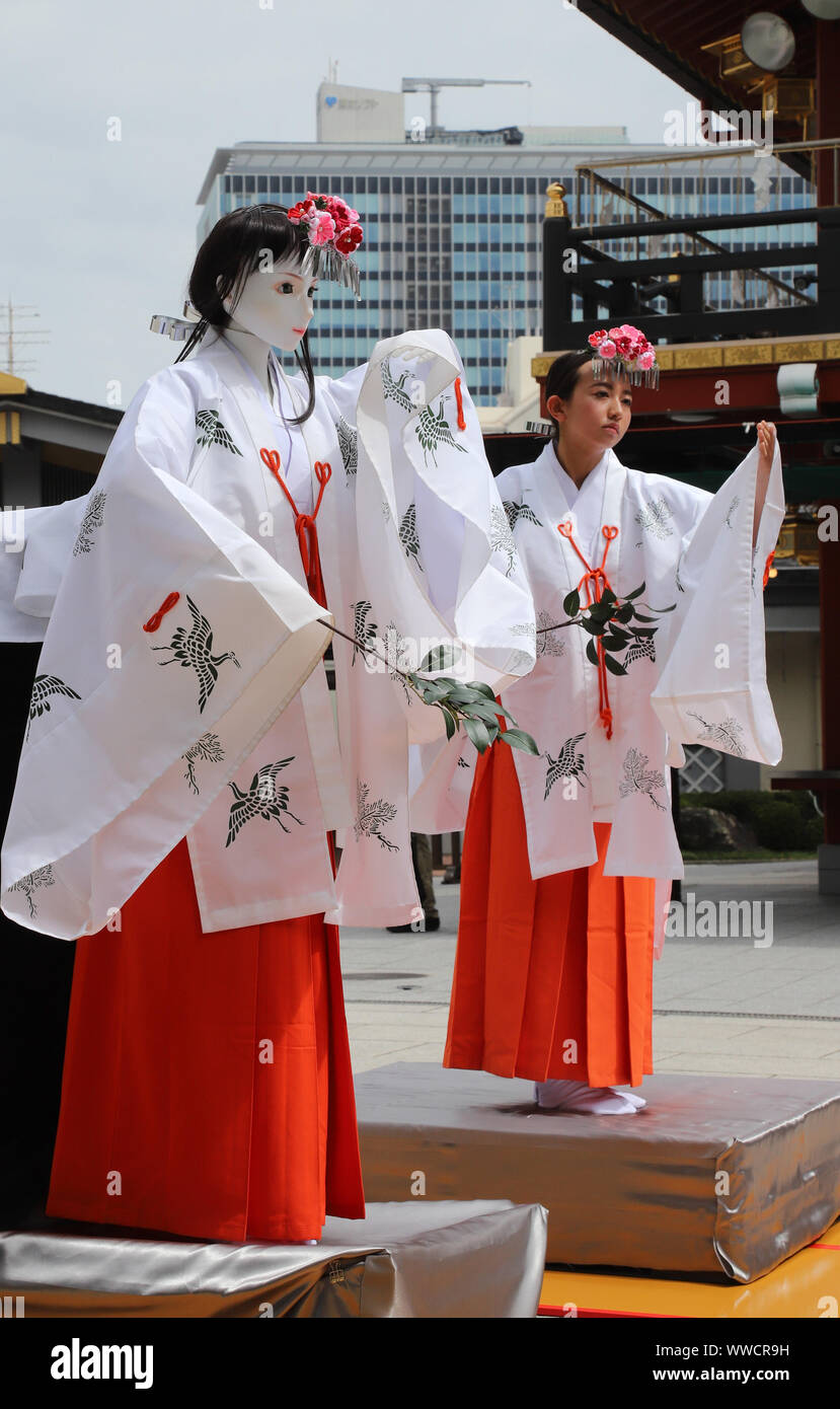 Tokyo, Japan. 14th Sep, 2019. A humanoid robot Cocona Kosaka (L) and ...