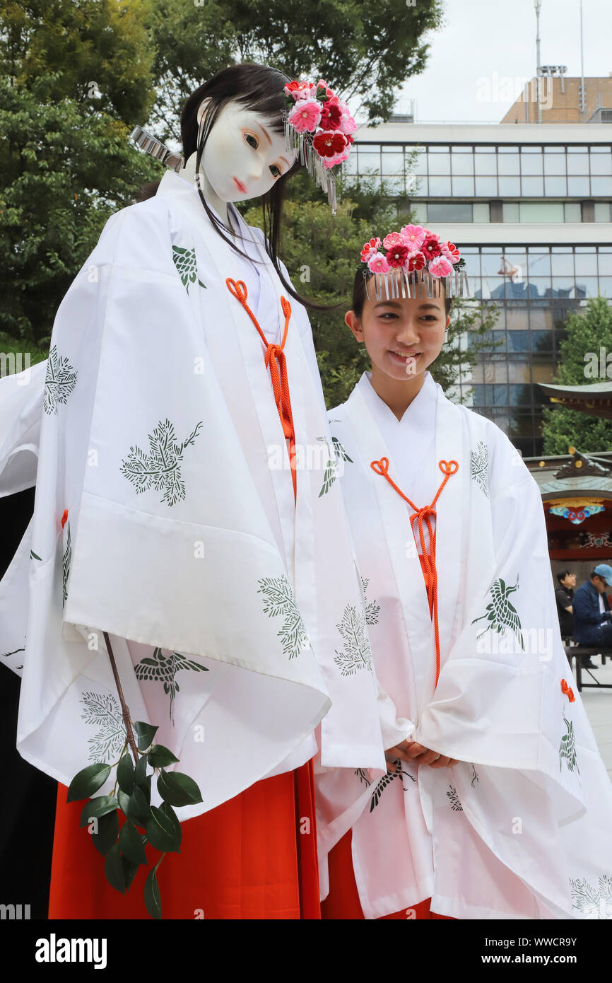 Tokyo, Japan. 14th Sep, 2019. A Japanese model Anju Ohata (R) smiles ...