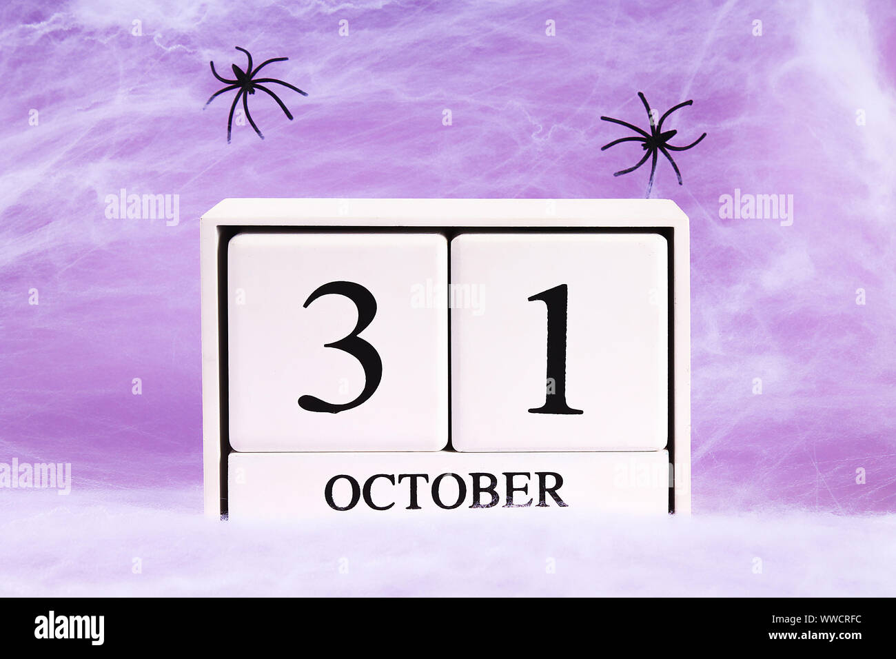 Halloween holiday concept. White spider web with two black spider web ...