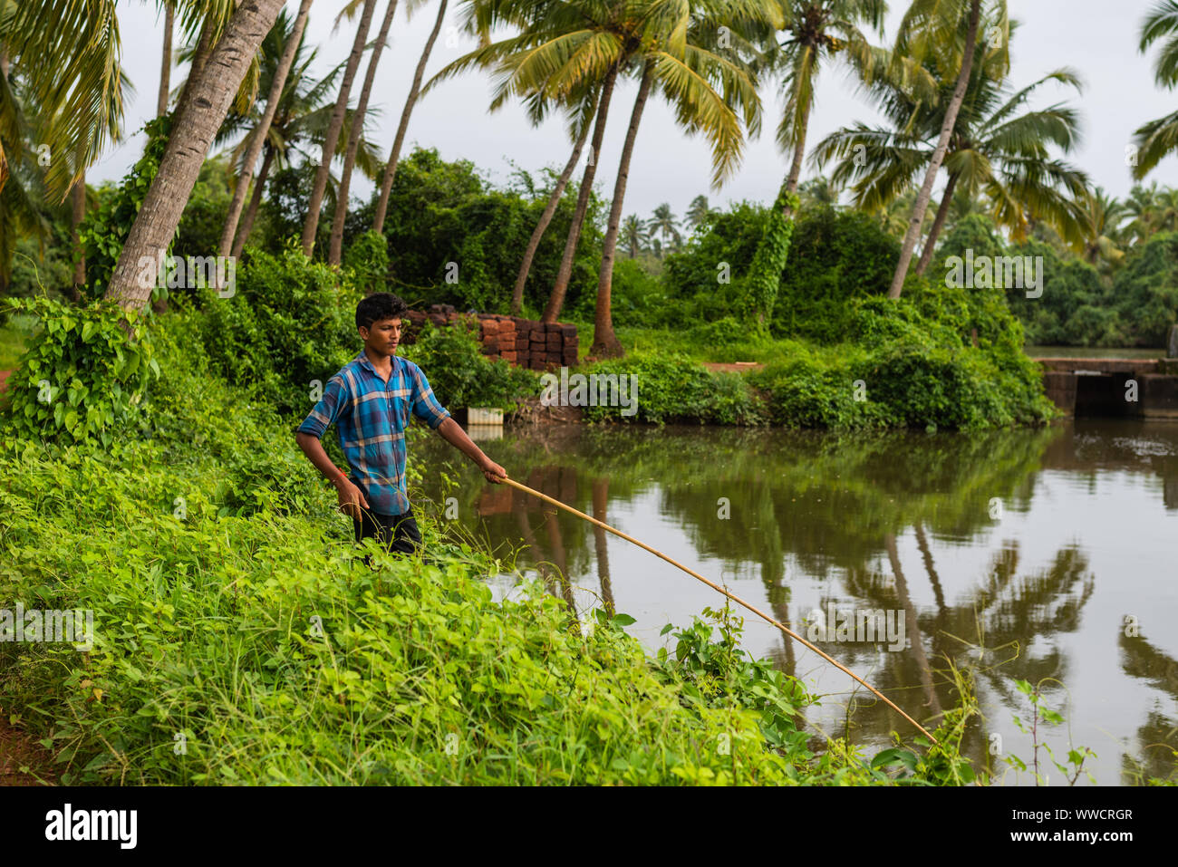Chinchinim, Goa/India- July 29 2019: Local boy trying his hand at ...