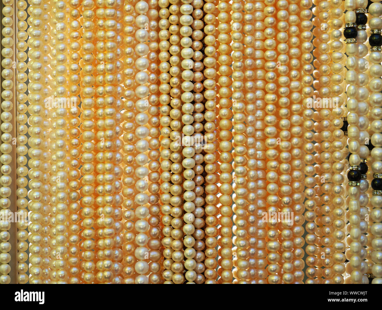 Long beads of natural river pearls Stock Photo - Alamy