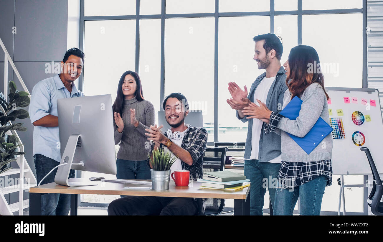 Creative director team applause for good solution of project with ...