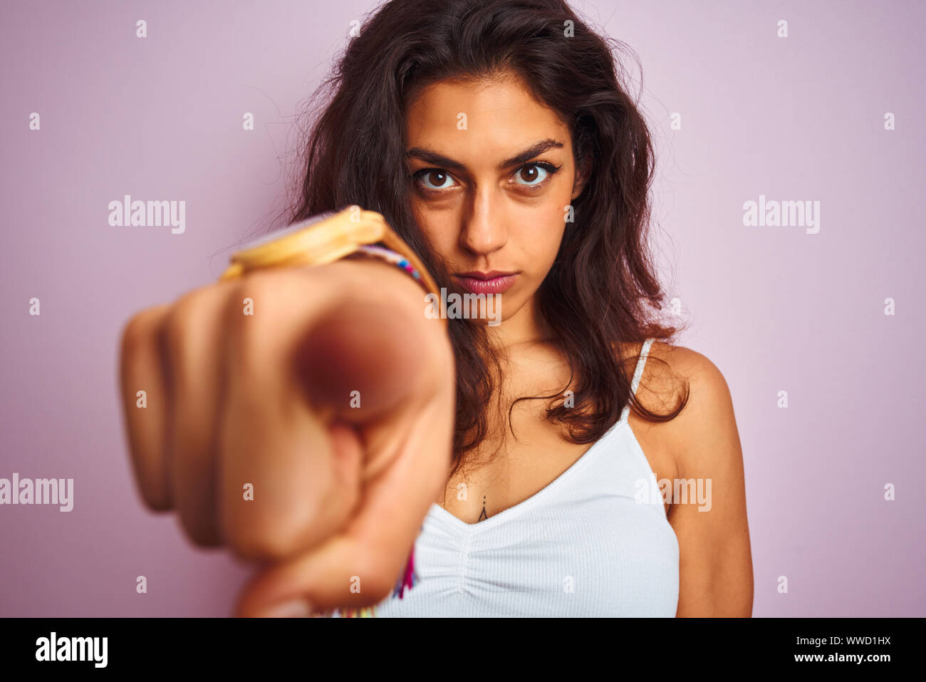 Young Beautiful Woman Wearing White T Shirt Standing Over Isolated Pink