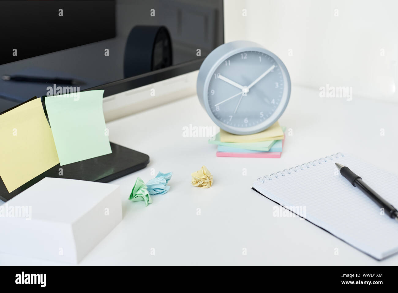 Modern workspace background. Workplace with clock, office supplies and ...