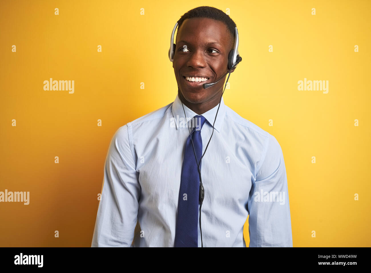 African american operator man working using headset over isolated ...