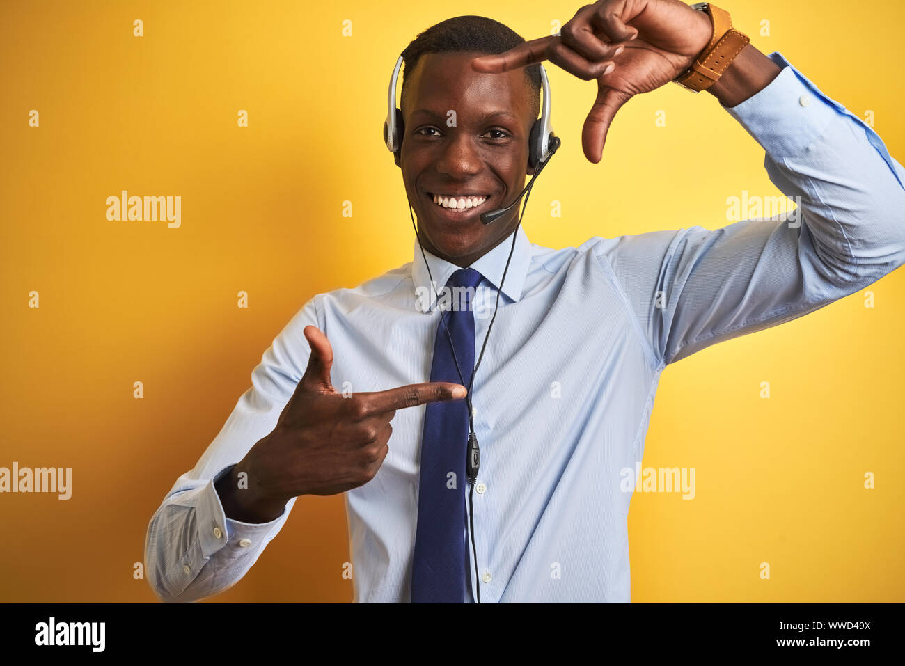 African american operator man working using headset over isolated ...