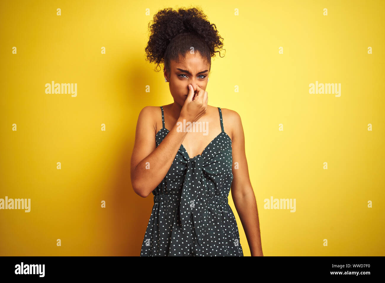 African american woman wearing summer casual green dress over isolated ...