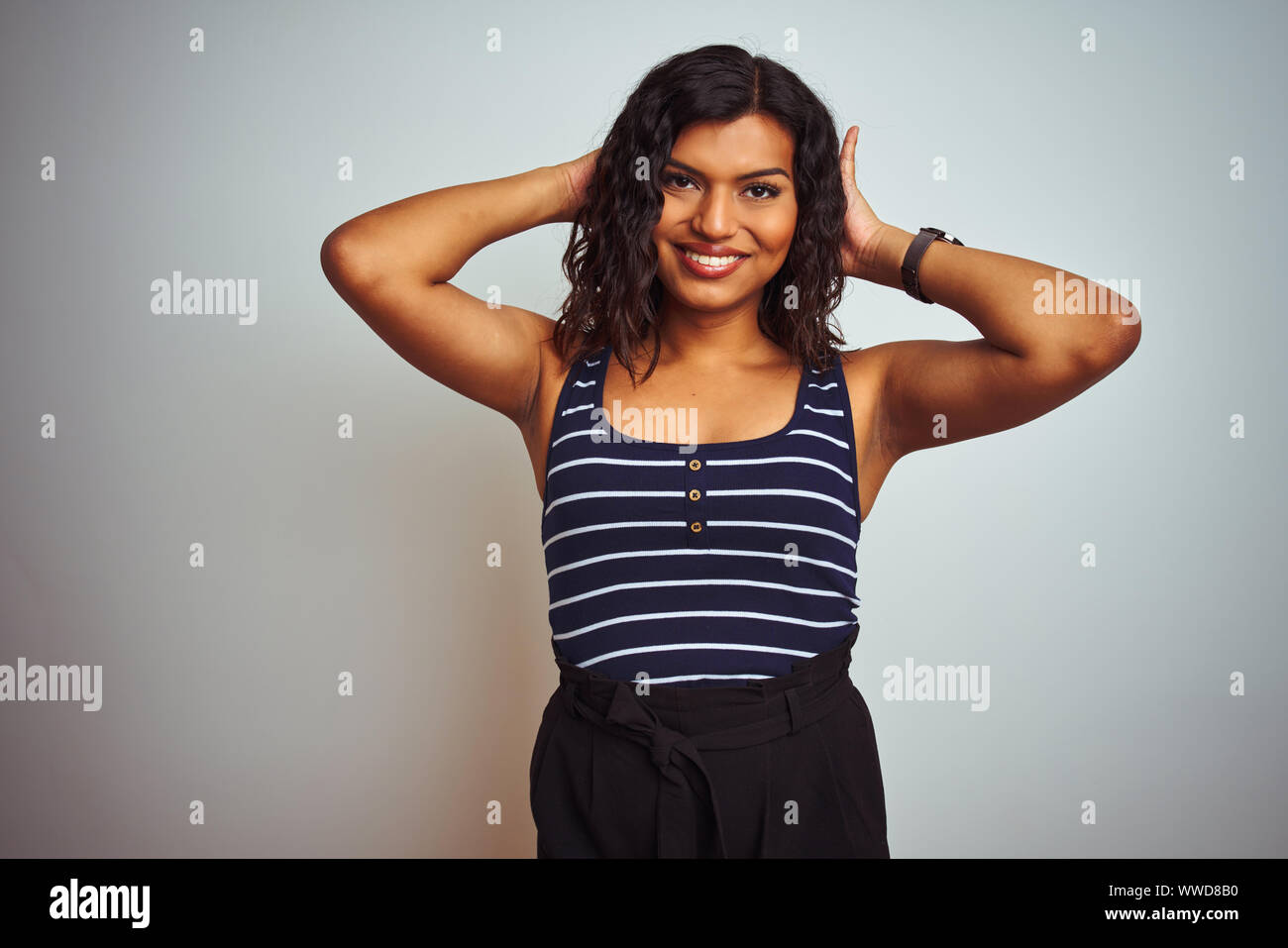 Transsexual transgender woman wearing striped t-shirt over isolated ...