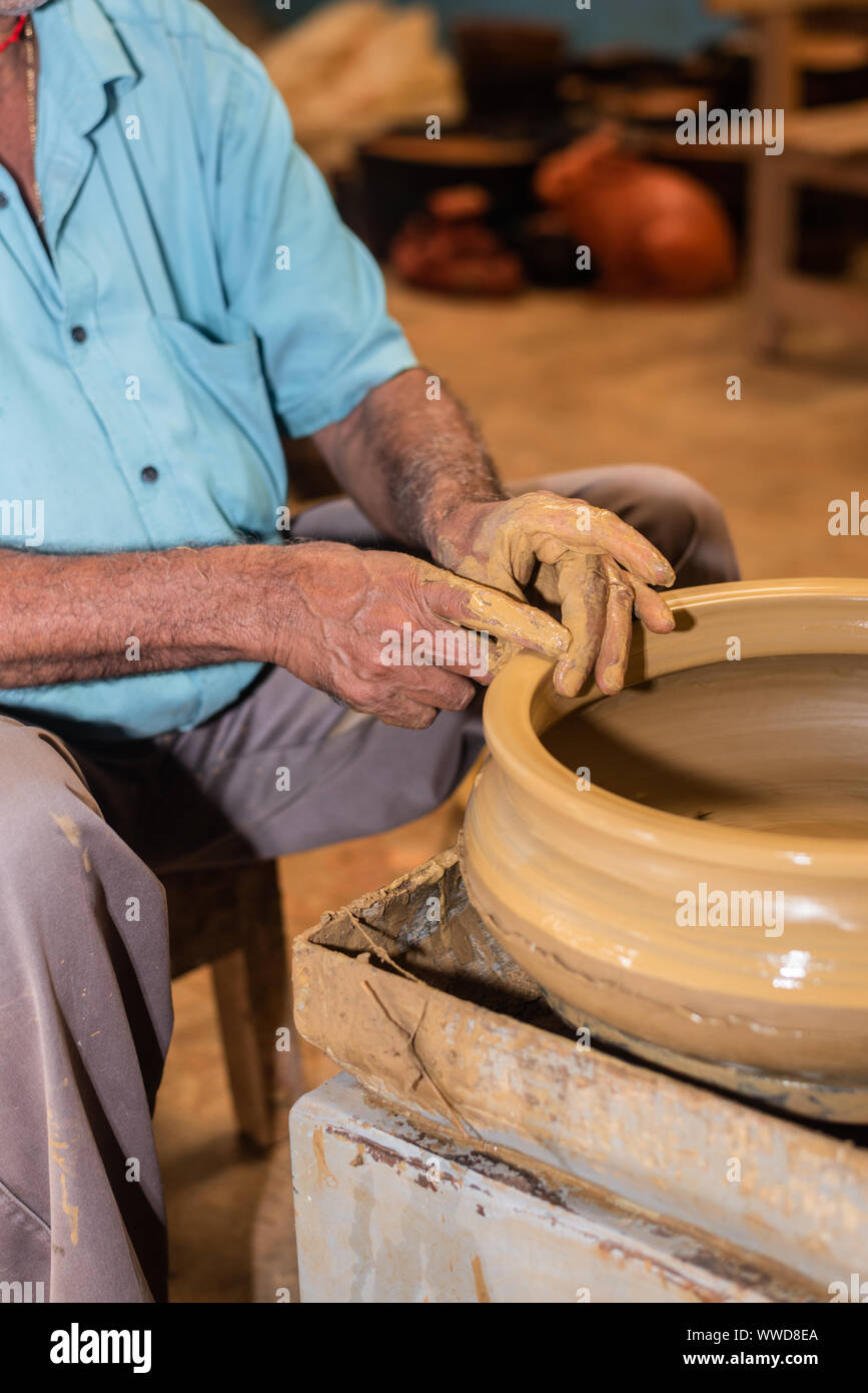 Local artisan working on clay pottery in Goa,India Stock Photo - Alamy