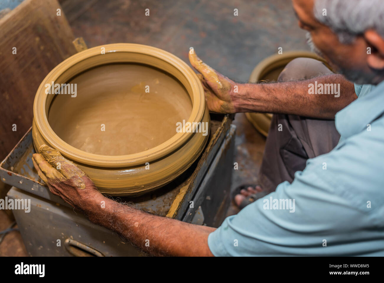 Local artisan working on clay pottery in Goa,India Stock Photo - Alamy