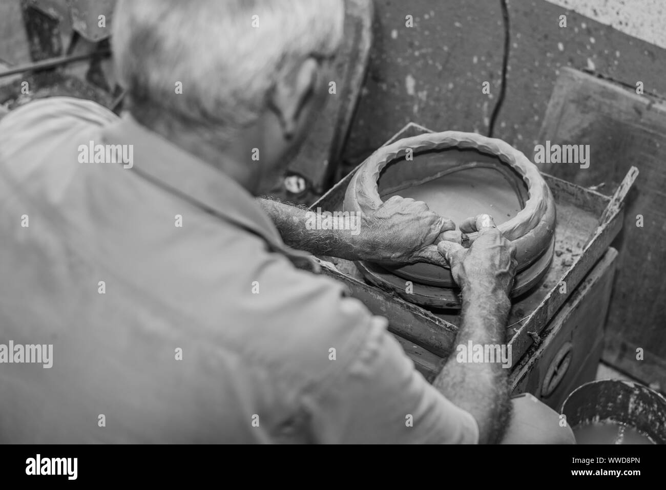 Local artisan working on clay pottery in Goa,India Stock Photo - Alamy