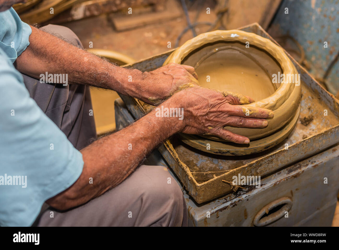 Local artisan working on clay pottery in Goa,India Stock Photo - Alamy