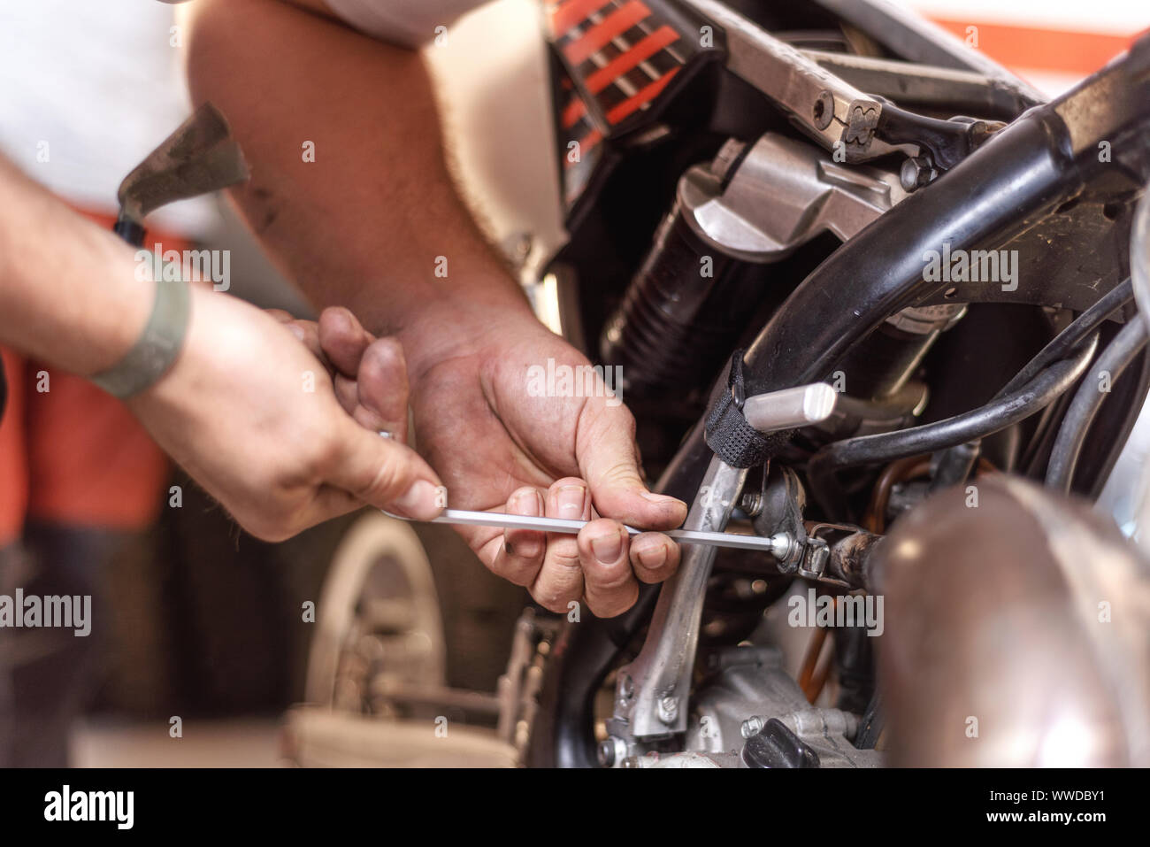 Mechanic working motorcycle workshop hi-res stock photography and ...