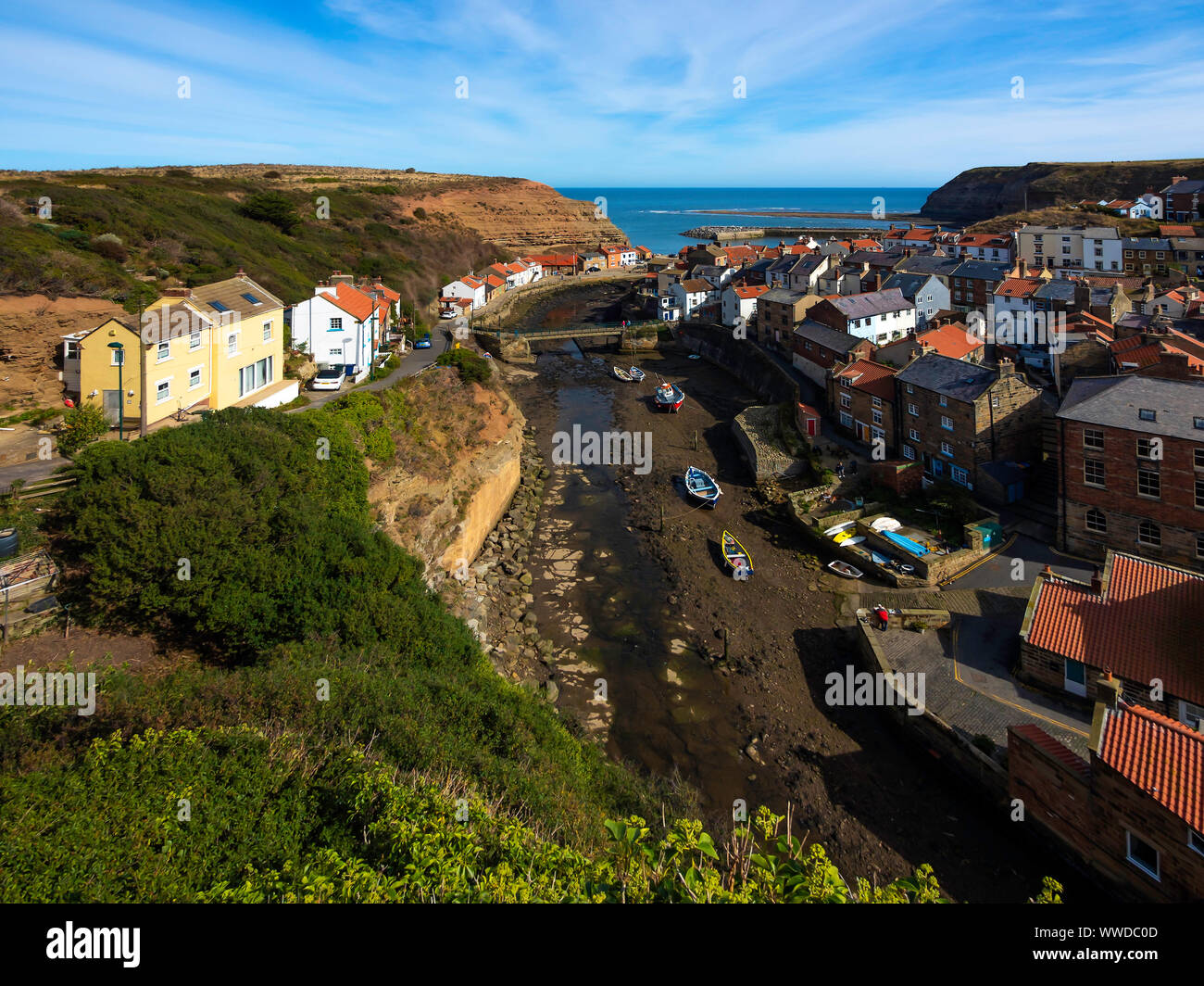 View looking seawards over the harbour of the North Yorkshire Village ...