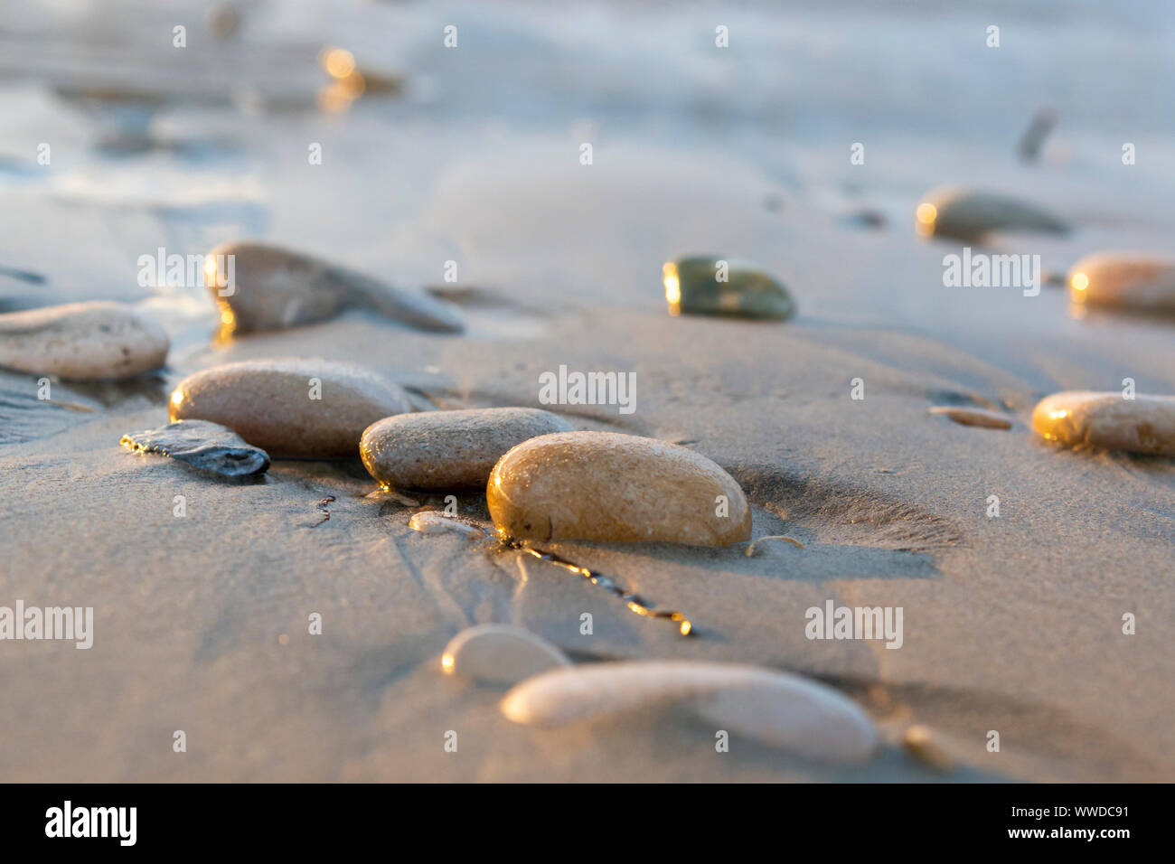 Stones on the beach and relax Stock Photo - Alamy