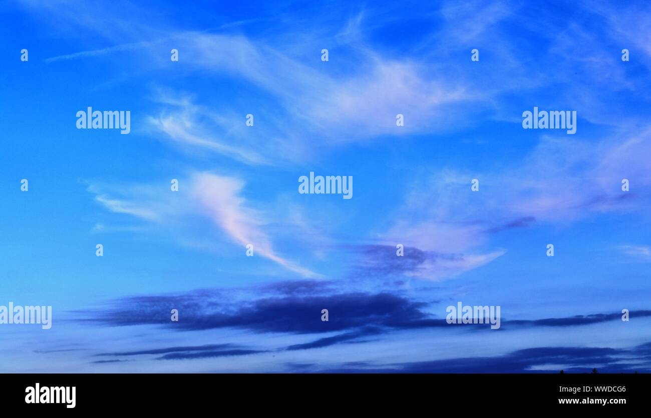 Stunning mixed cloud formation panorama on a deep blue summer sky Stock ...