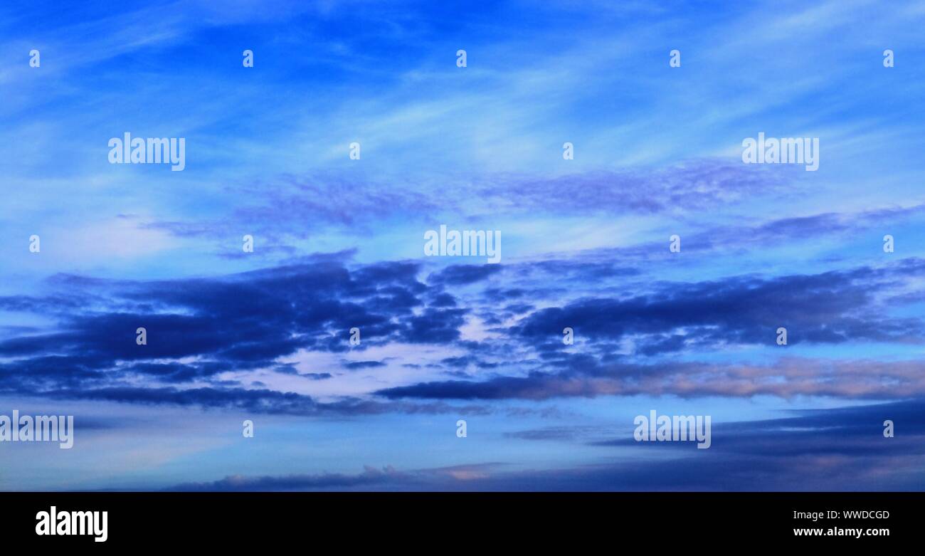 Stunning mixed cloud formation panorama on a deep blue summer sky Stock ...
