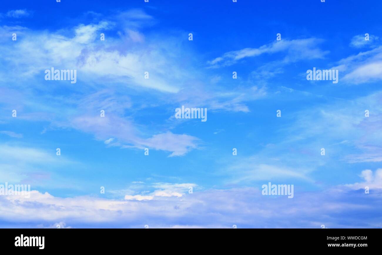 Stunning mixed cloud formation panorama on a deep blue summer sky Stock ...
