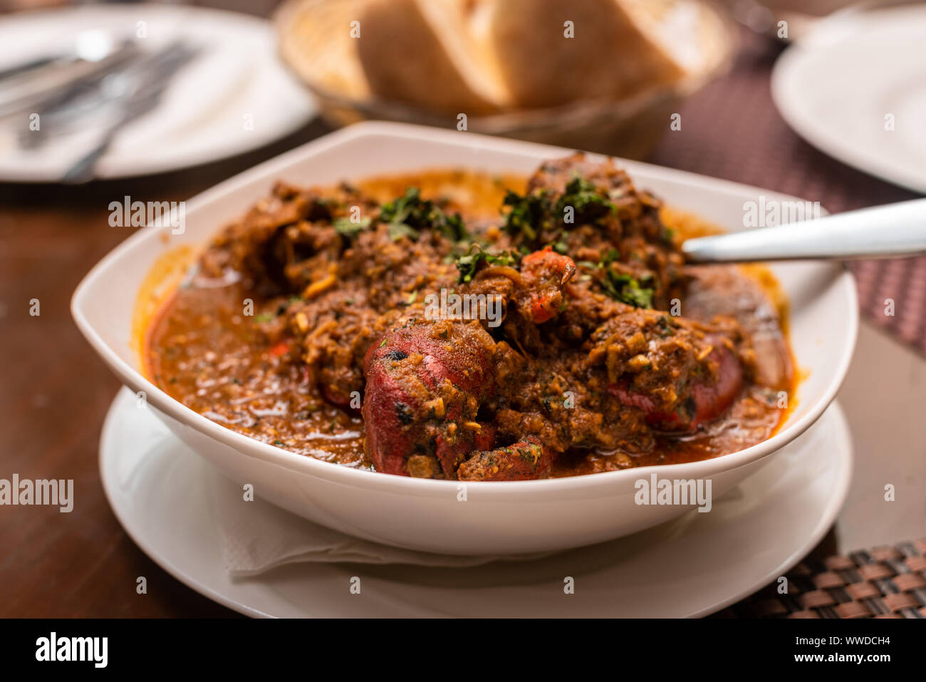 Goan Seafood crab xek xek served for dinner Stock Photo - Alamy