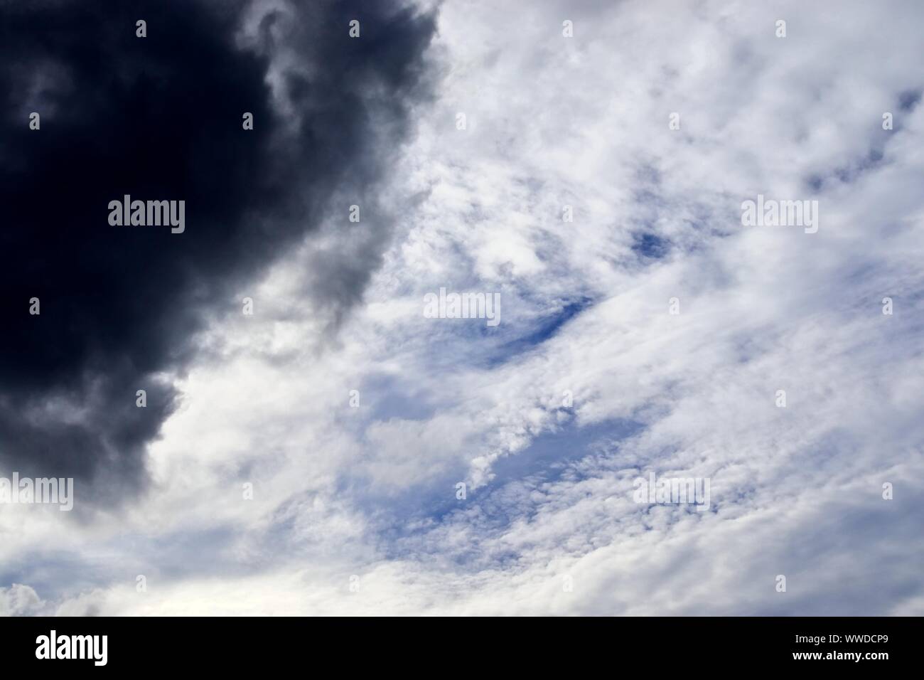 Stunning mixed cloud formation panorama on a deep blue summer sky Stock ...