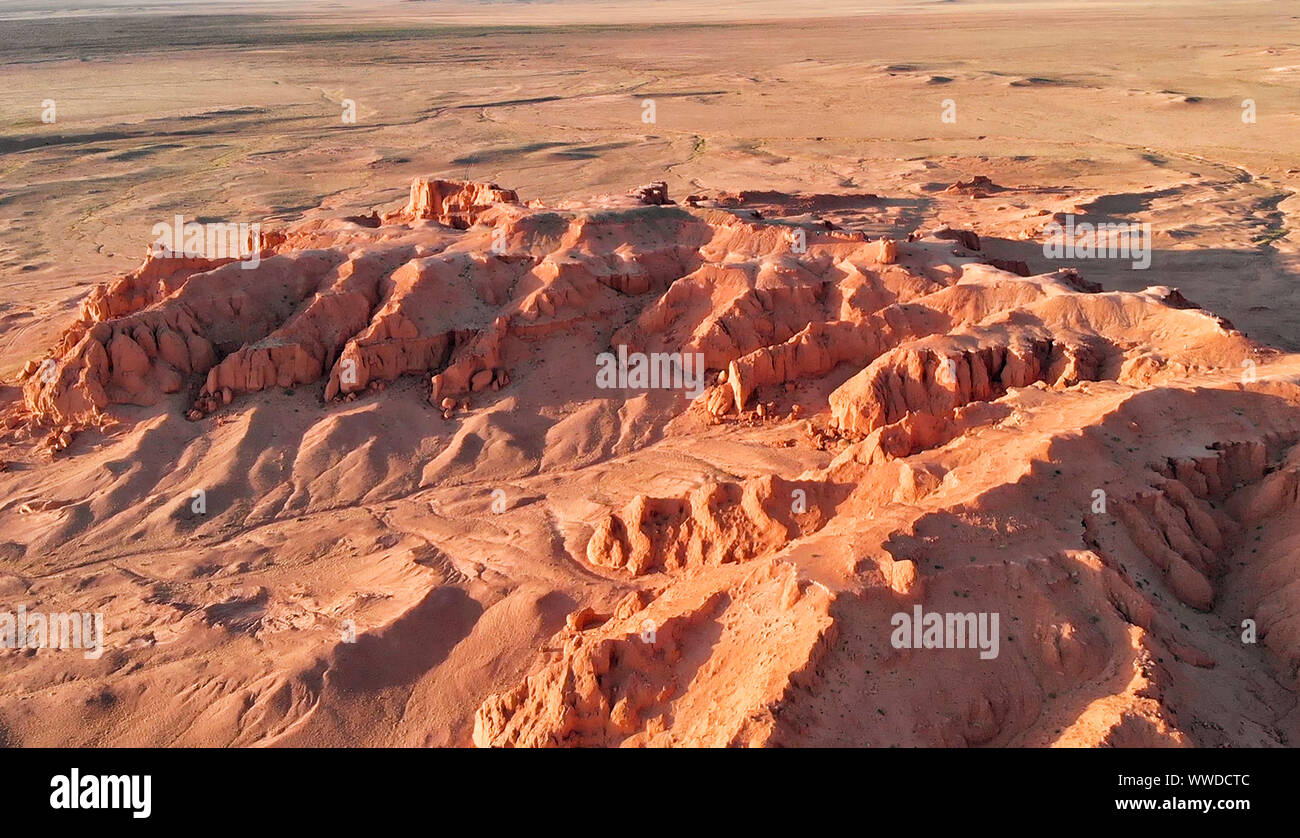 Aerial view of the Bayanzag, flaming cliffs, Gobi Desert, Mongolia ...