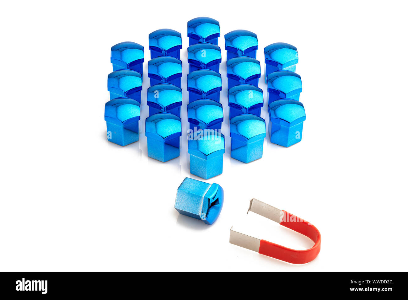 colored caps for automotive nuts or bolts, blue. Close up white ...