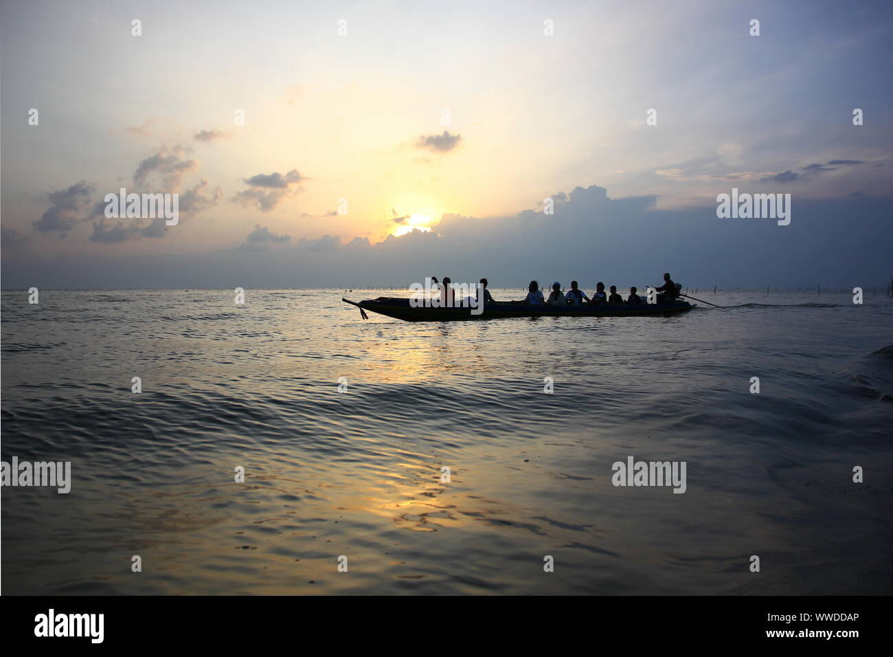 silhouette tourist on long tail boat ,one day boat trip for tourist in ...