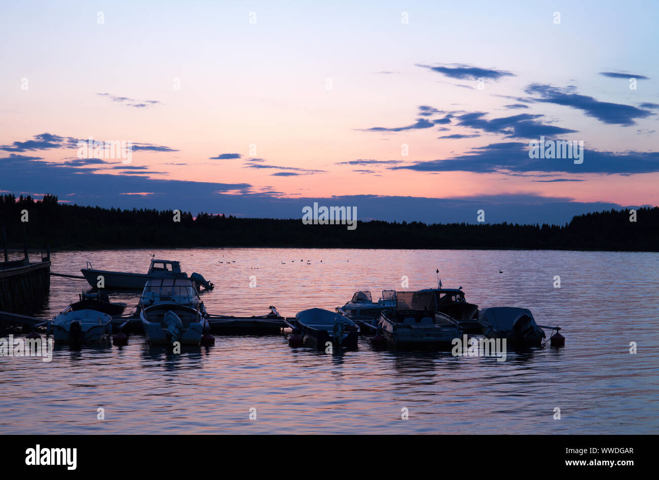 Nordic night with Nordic light in June and July. Boats this side ...