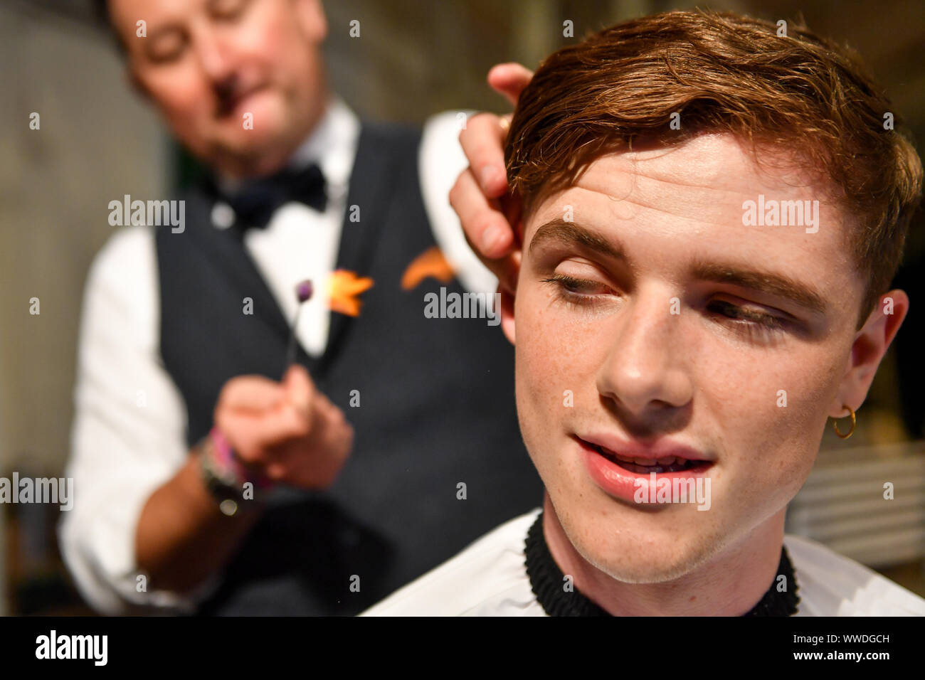 Luke Duffy is given singe hair treatment during the Peaky Blinders ...