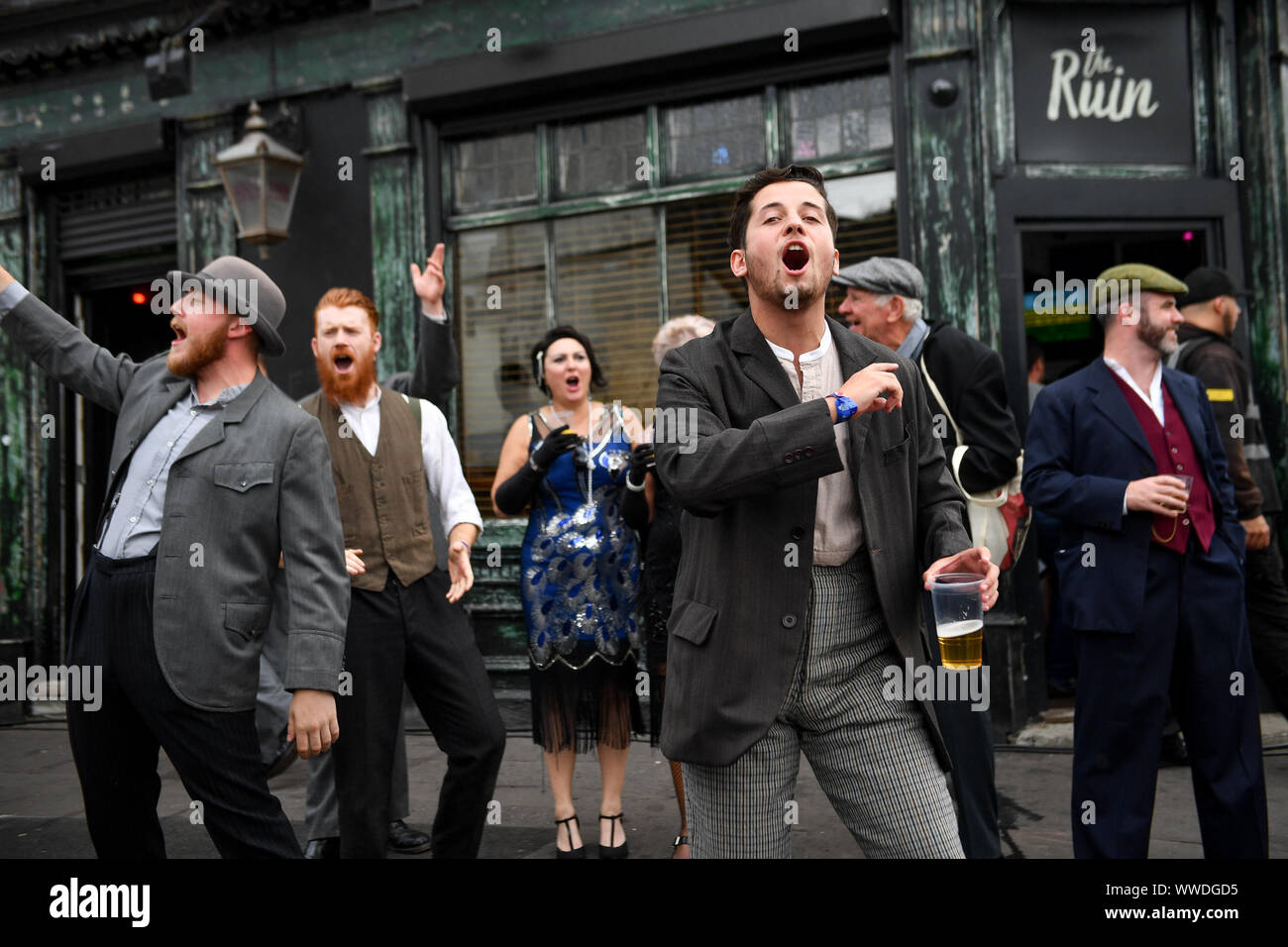 Actors recreate scenes on the streets of Digbeth during the Peaky ...