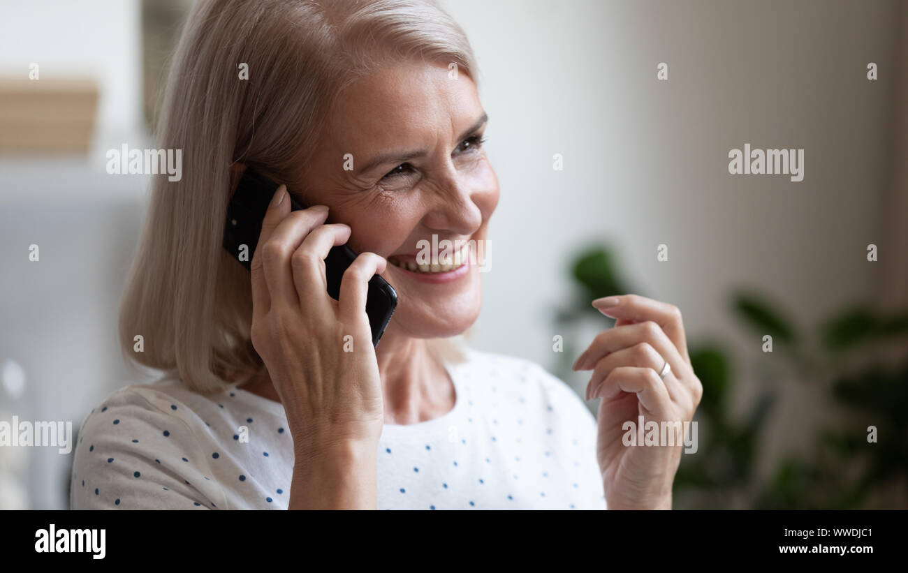 Senior woman smartphone making call hi-res stock photography and images ...