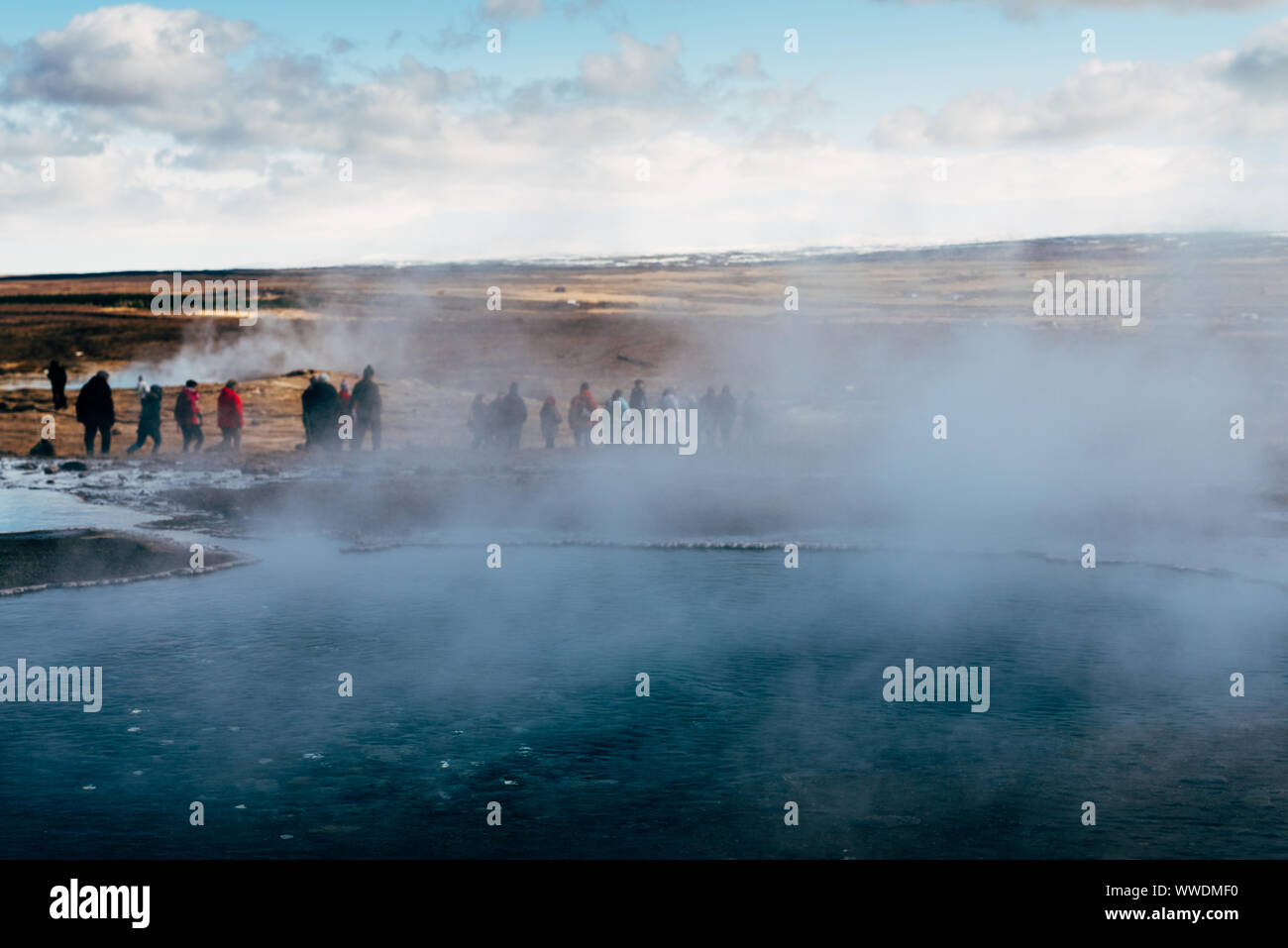 Strokkur geyser with tourist crowd in the background, Iceland Stock ...