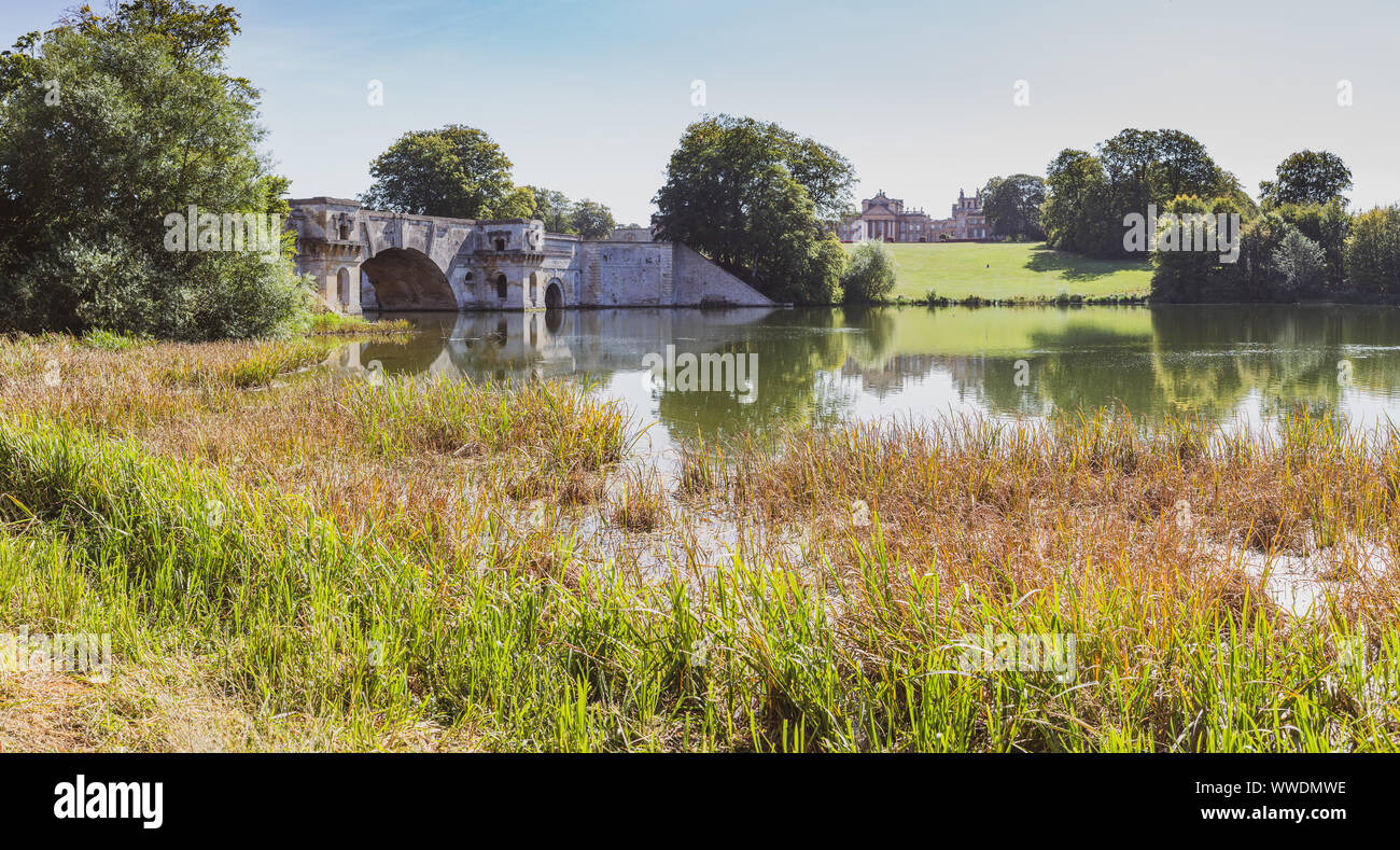 View across a lake towards the Oxfordshire stately home of Blenheim ...