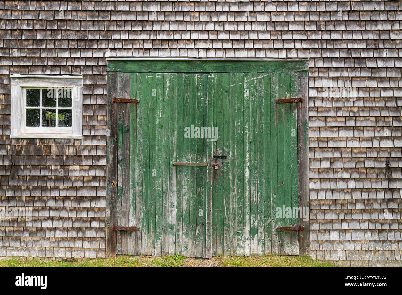 Weathered rustic old green barn doors with cedar shingles Stock Photo ...