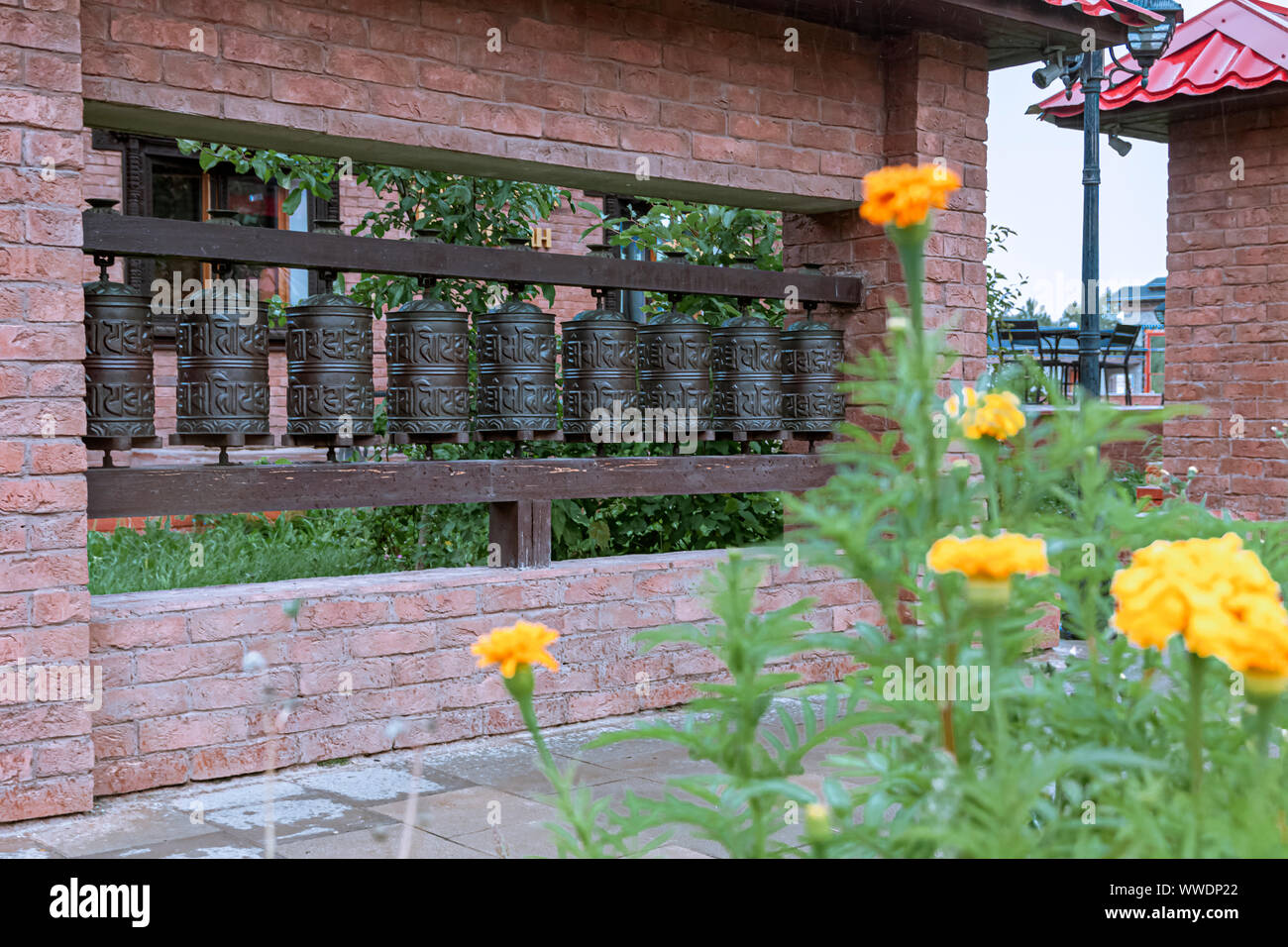Small bells in a Chinese temple, flowers in the foreground Stock Photo ...