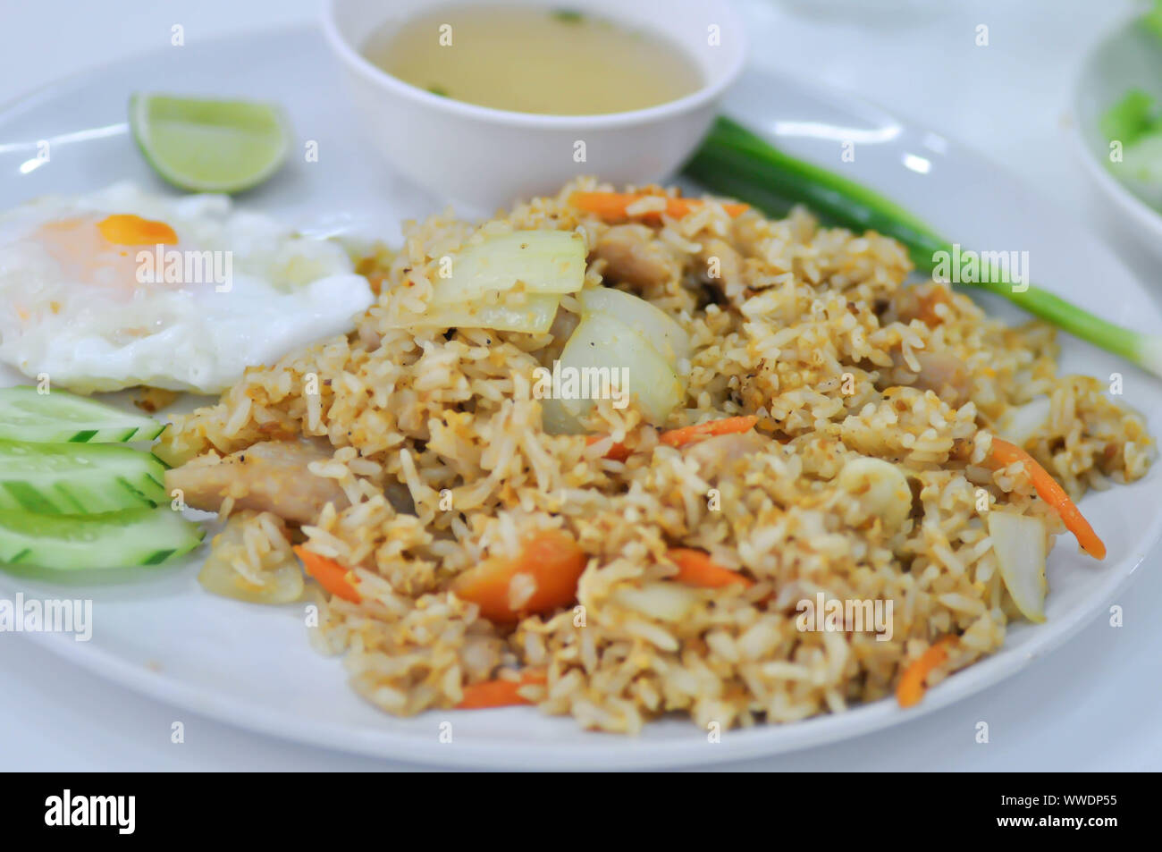fried rice or stir-fried rice with fried egg and cucumber Stock Photo ...