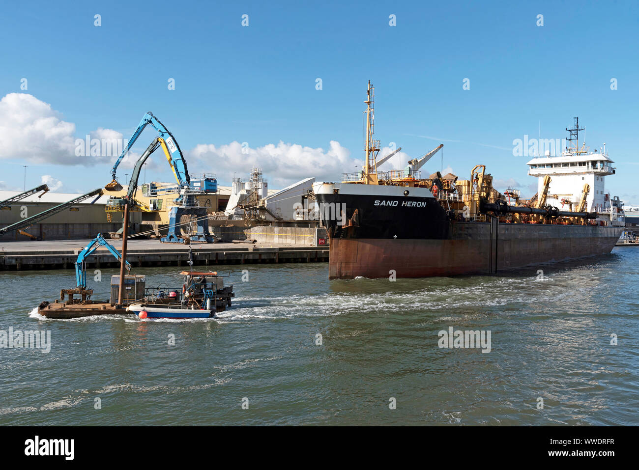 Port of Poole, southern England, UK. A deck cargo vessel underway and ...